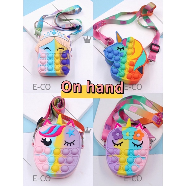 On hand pop it bag Toy Messenger Bag and shoulder Bag Fidget Toy ...