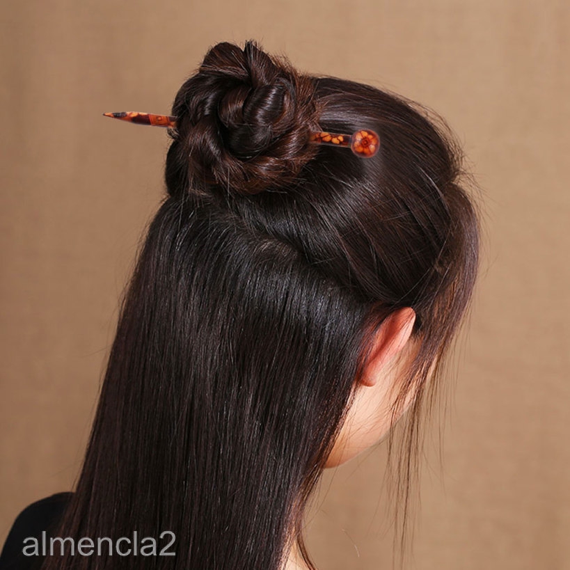 Traditional Chinese Hairstyle With Chopsticks