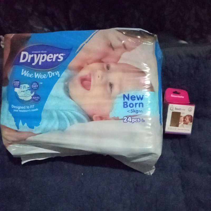 Drypers newborn 24 pcs with free baby nipple | Shopee Philippines