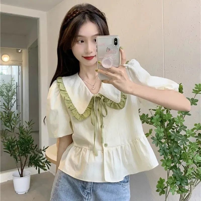 Baby collar puff sleeve shirt design sense niche blouse Korean sweet ... Baby collar puff sleeve shirt design sense niche blouse Korean sweet ...